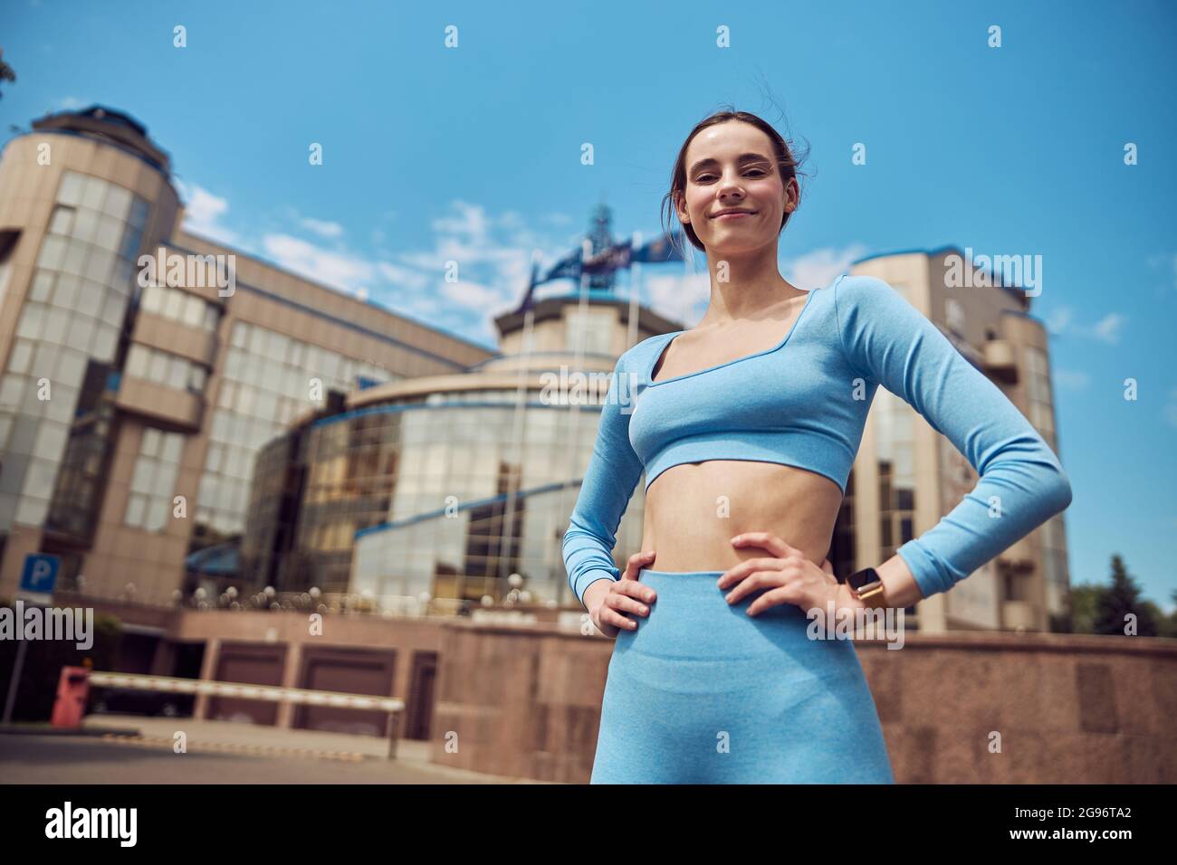 Beautiful fit young woman jogger is running outdoors Stock Photo - Alamy