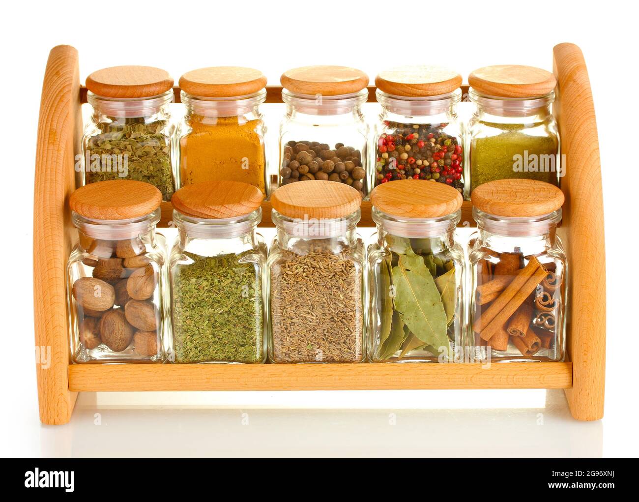 powder spices in glass jars on wooden shelf isolated on white Stock ...
