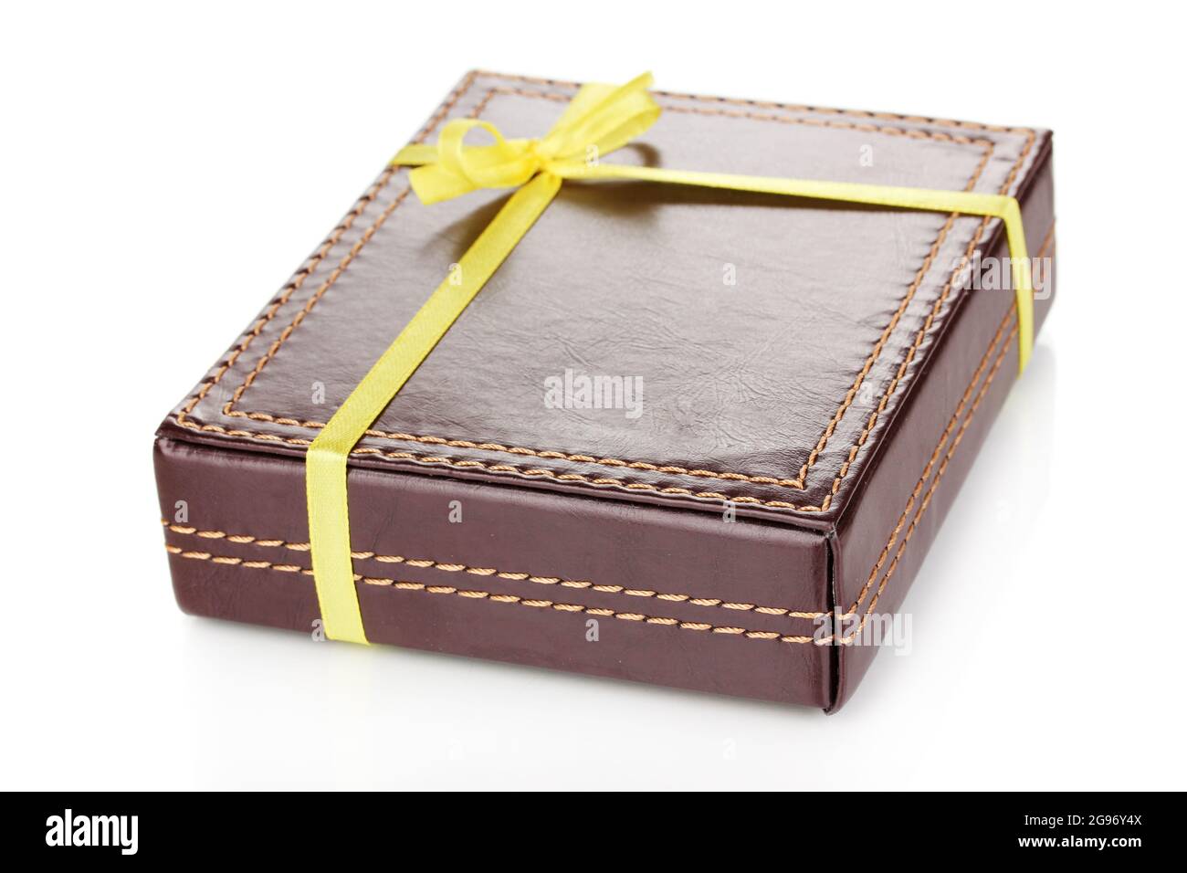 Brown box with ribbon isolated on white Stock Photo - Alamy