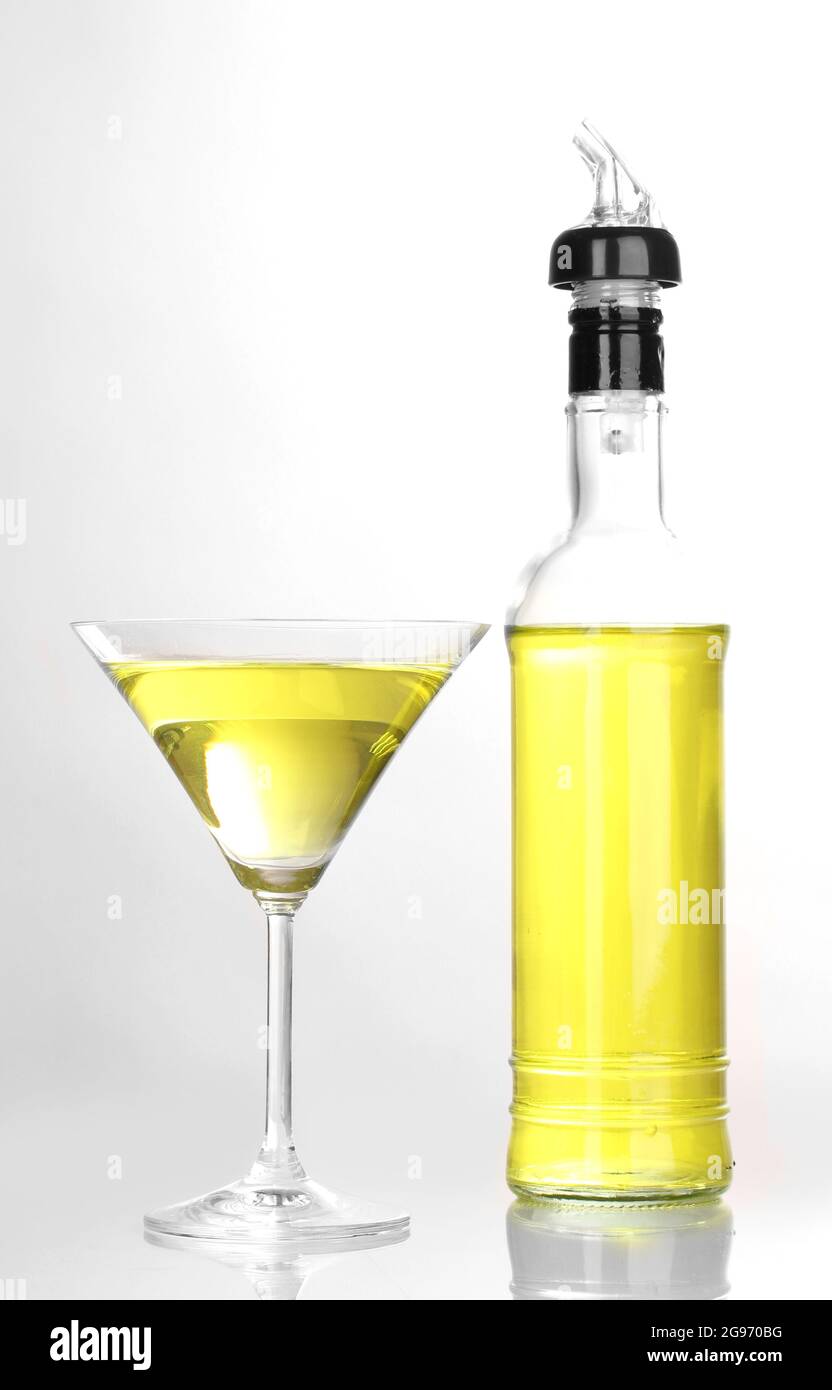 Tasty yellow cocktail isolated on white Stock Photo - Alamy