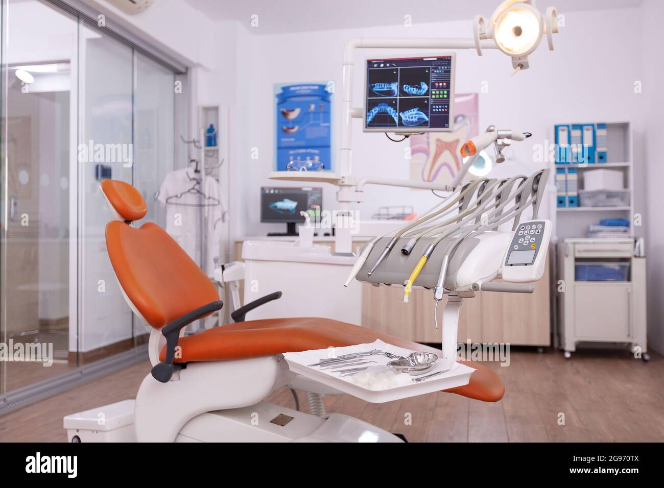 Interior of empty oral stomatology orthodontist office with dental ...