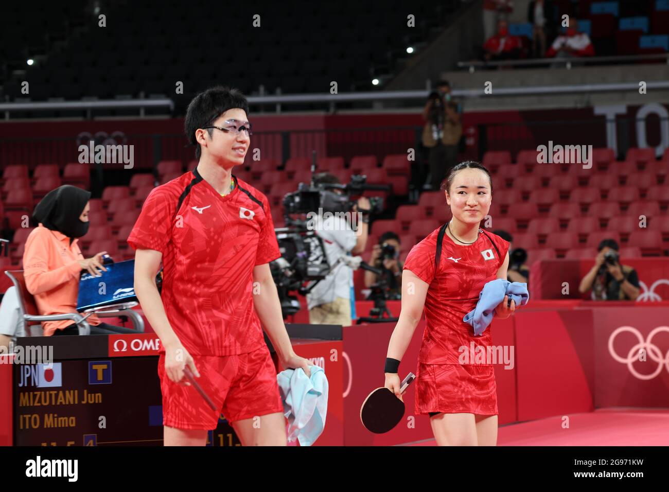 Tokyo, Japan. 24th July, 2021. (L to R) Jun Mizutani (JPN), Mima Ito ...