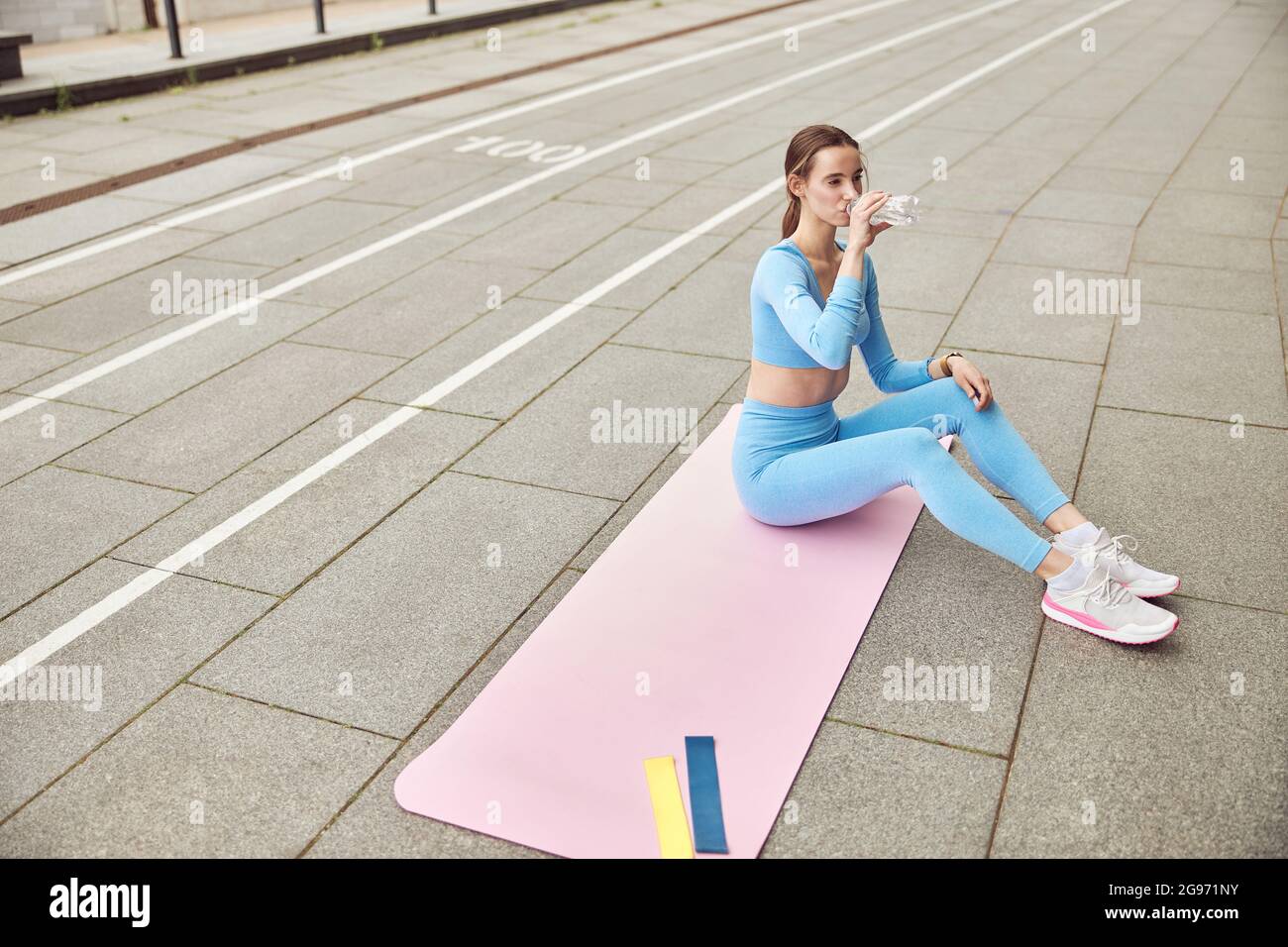 Happy female marathon runner hi-res stock photography and images - Alamy