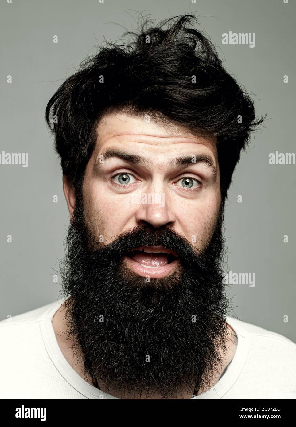 Funny face. Surprised handsome man. Shocked male model with surprise ...