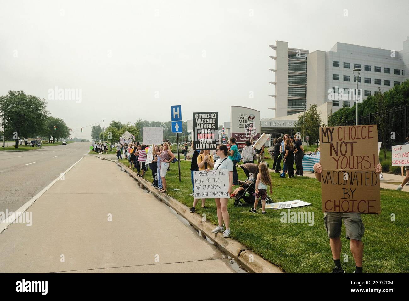 Protesters holding placards expressing their opinion while chanting ...