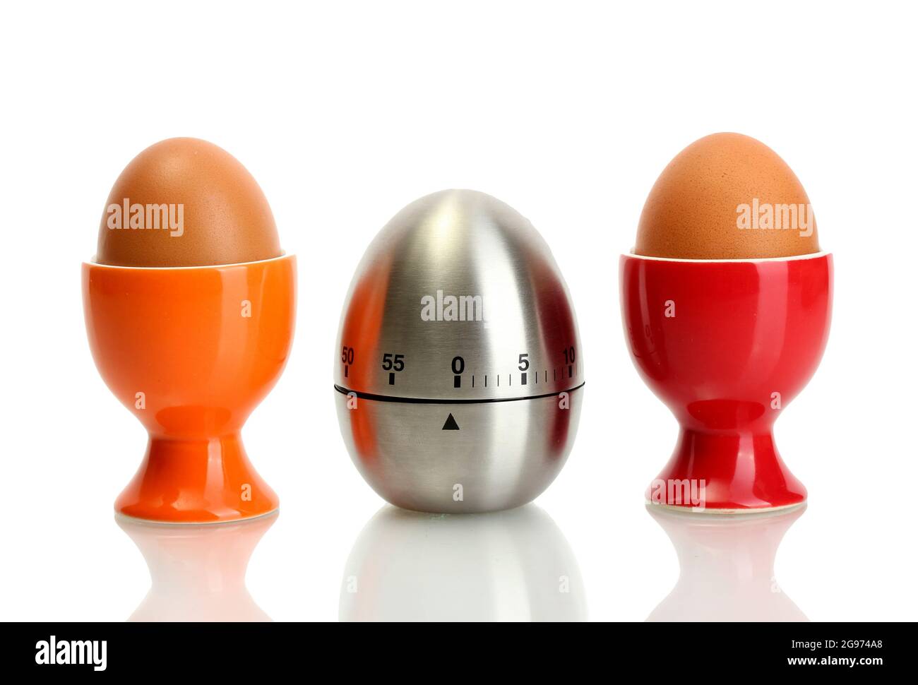 egg timer and egg in color stand isolated on white Stock Photo - Alamy