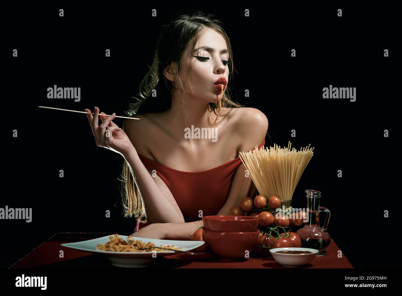 Sensual woman eat spaghetti. Healthy food concept. Hunger and appetite ...