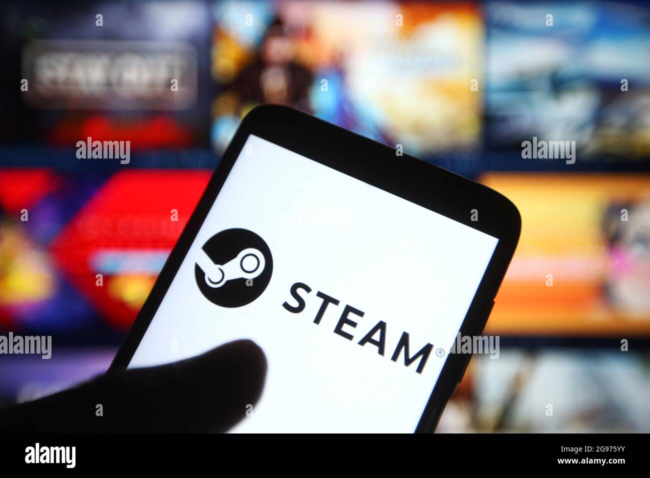 In this photo illustration a Steam logo of a video game digital ...