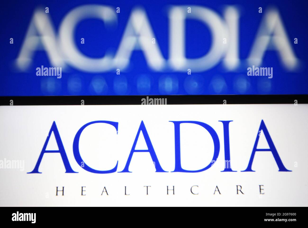 In this photo illustration an Acadia Healthcare logo is seen on a ...