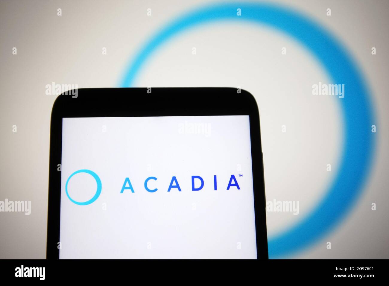 In this photo illustration an Acadia Pharmaceuticals logo is seen on a ...