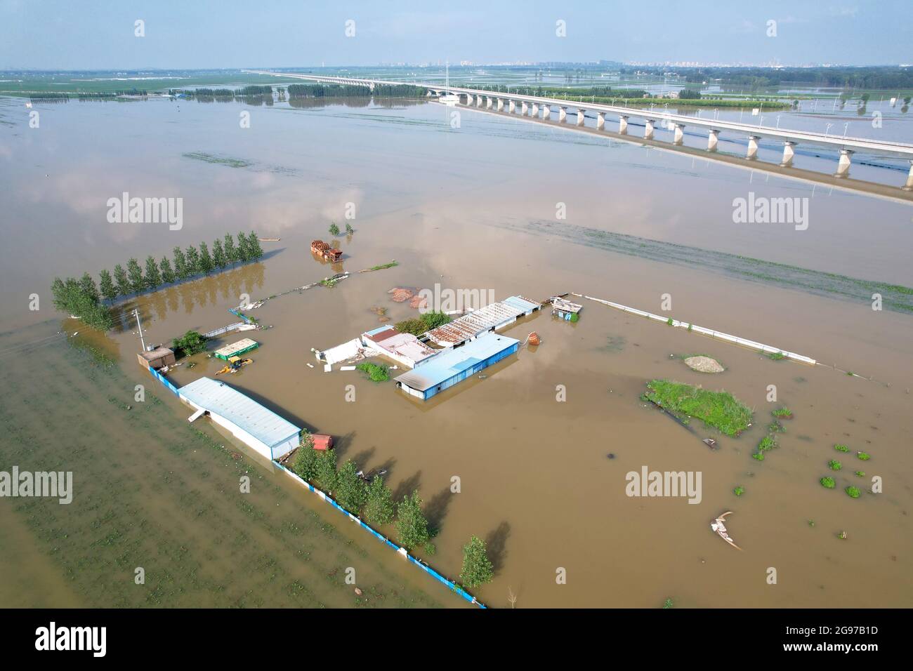 ANYANG, CHINA - JULY 24, 2021 - Roads and crops are flooded in the ...