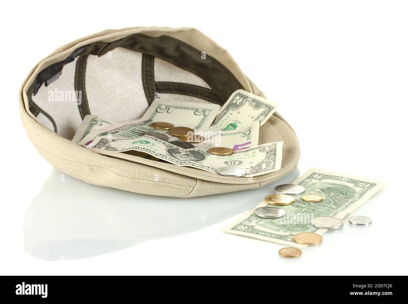 cap with money on a white background Stock Photo - Alamy