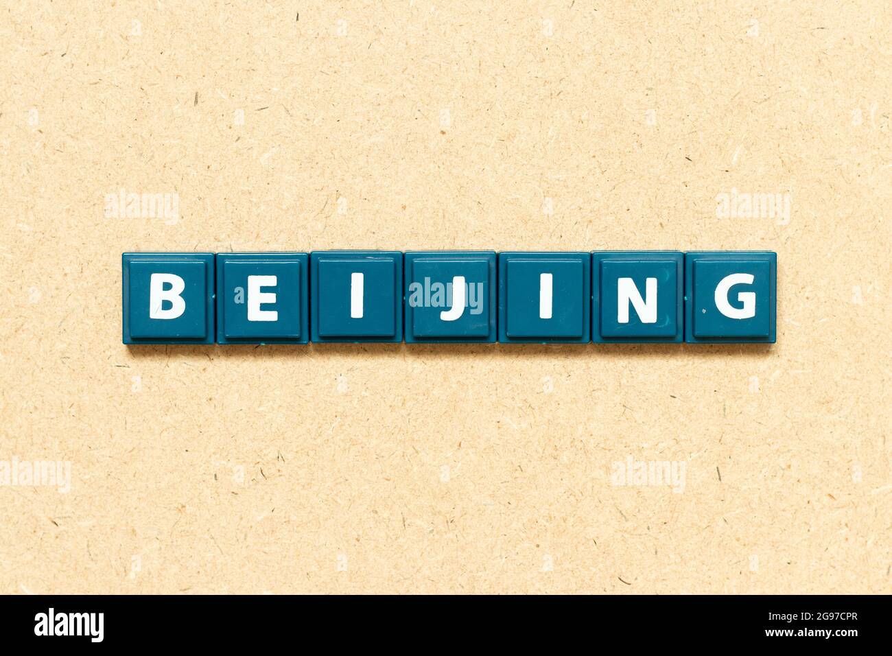 Tile alphabet letter in word beijing on wood background Stock Photo - Alamy