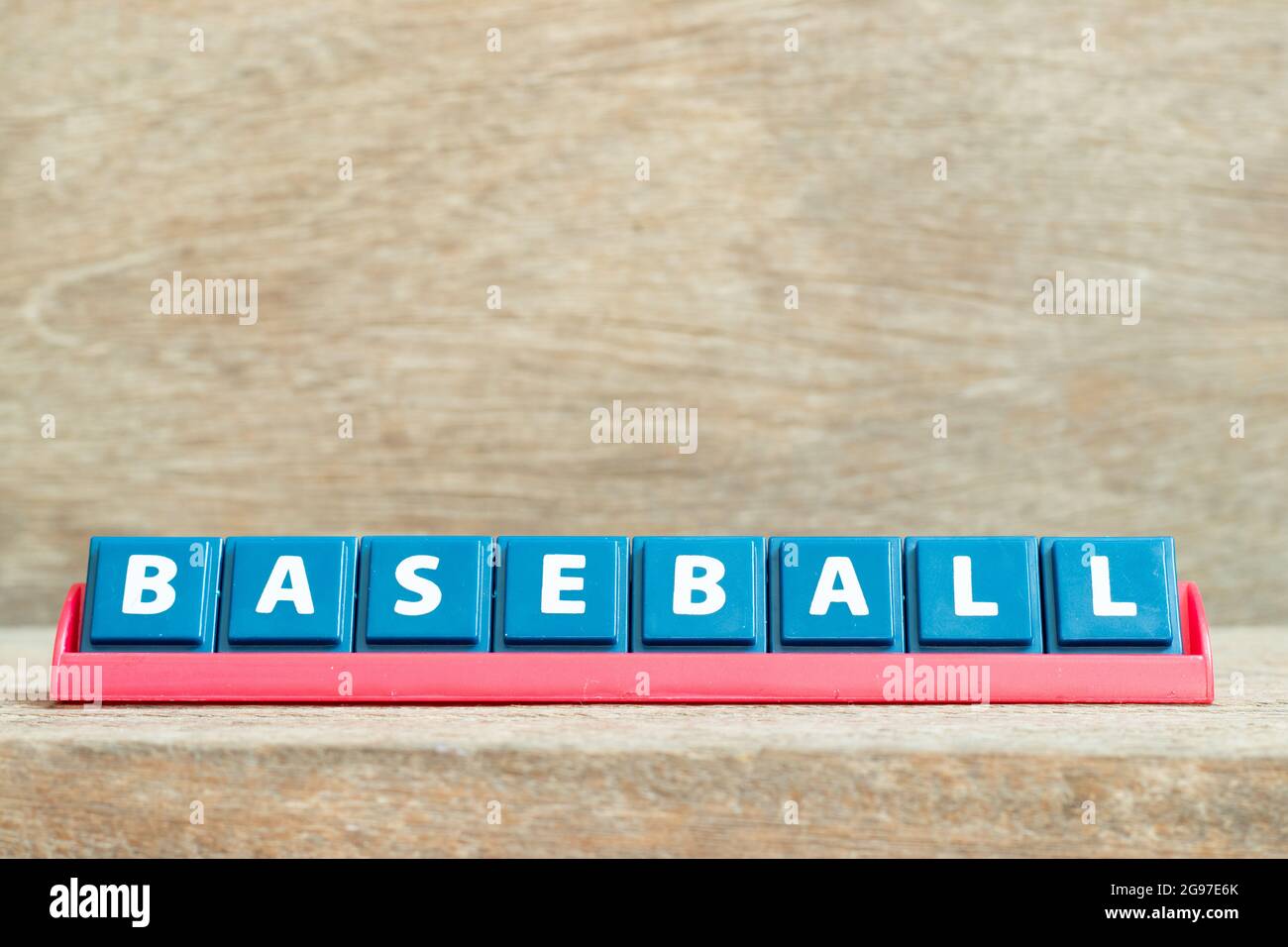 Tile alphabet letter with word baseball in red color rack on wood ...