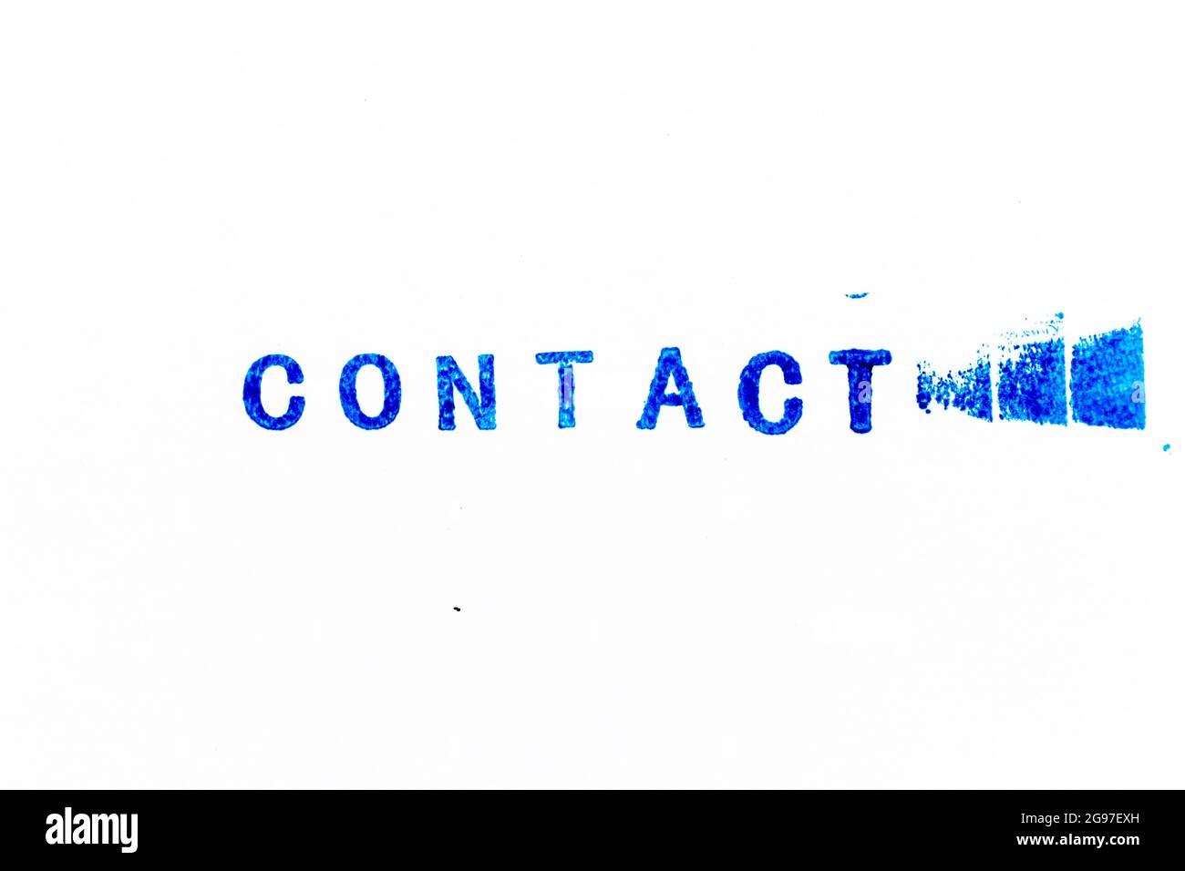 Blue color ink of rubber stamp in word contact on white paper ...