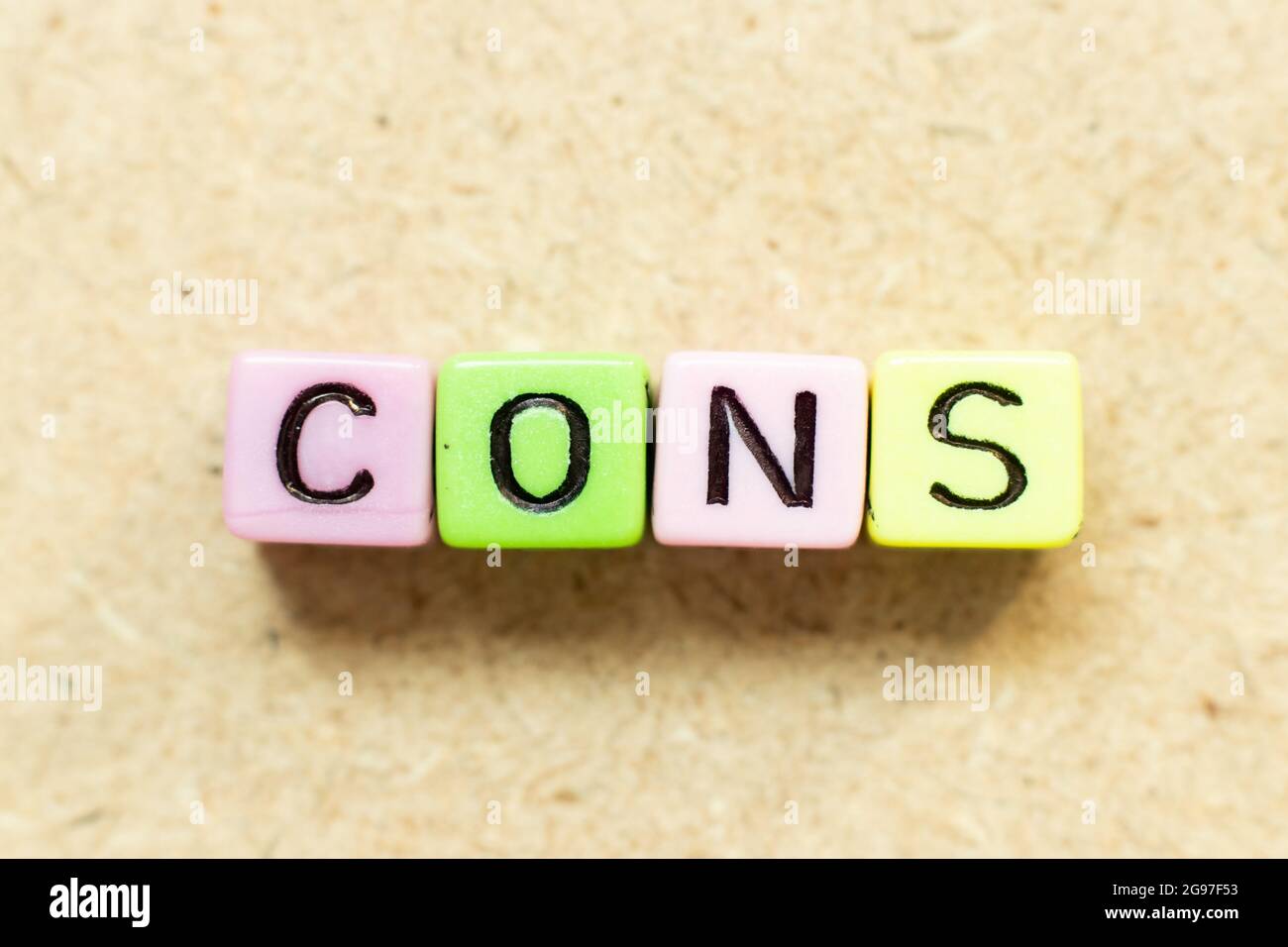 Color alphabet letter block in word cons on wood background Stock Photo ...