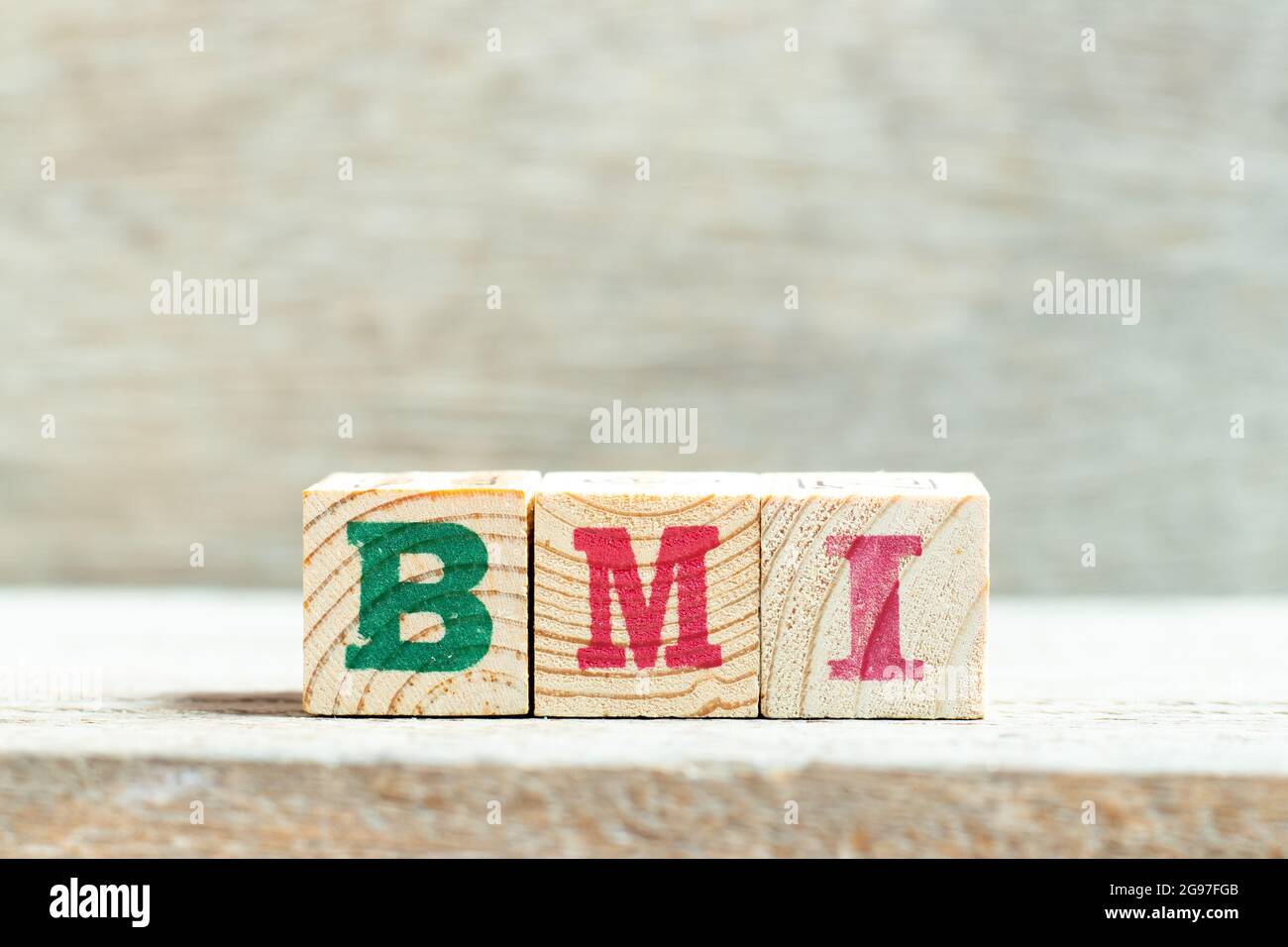 Alphabet letter block in word BMI (abbreviation of body mass index) on ...
