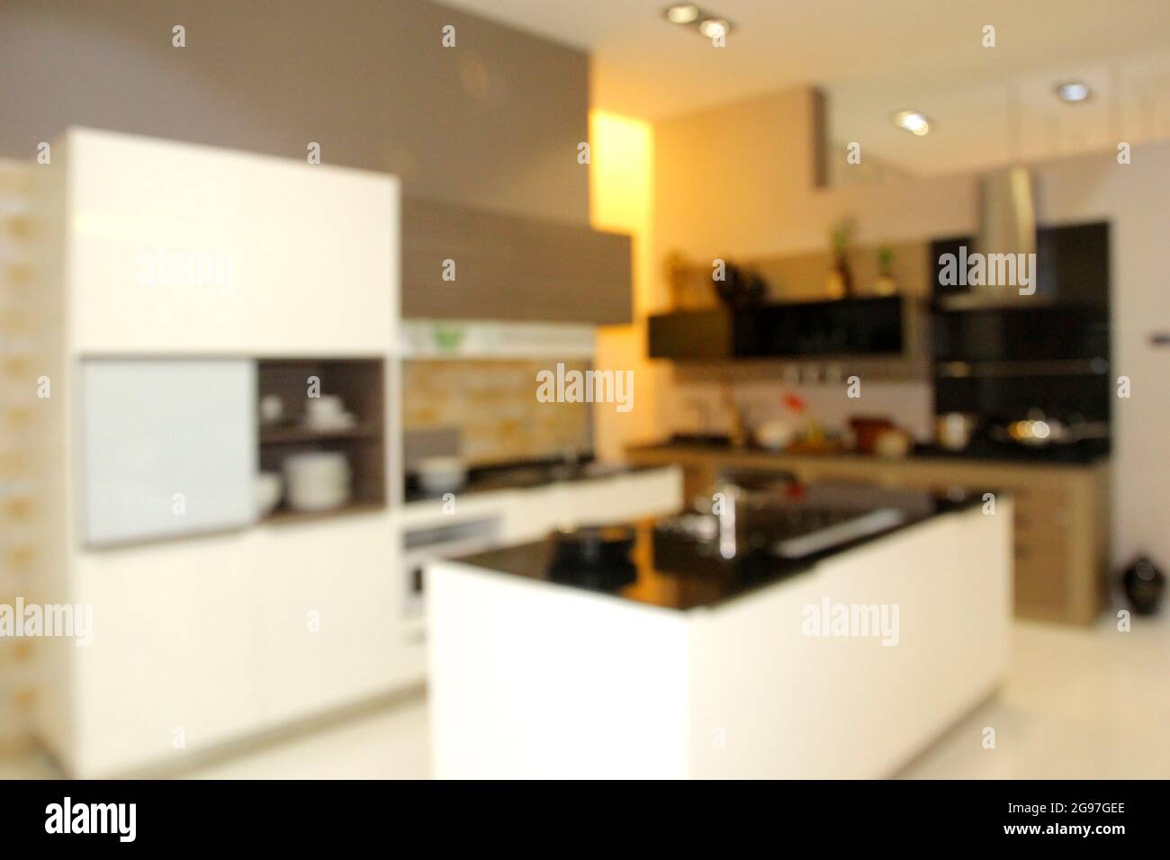 blurred modern kitchen interior design as background Stock Photo - Alamy