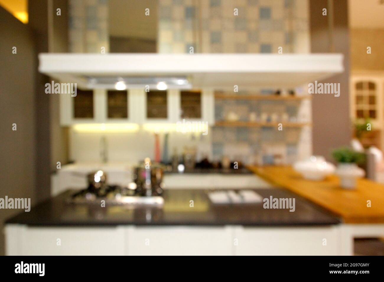 blurred modern kitchen interior design as background Stock Photo - Alamy