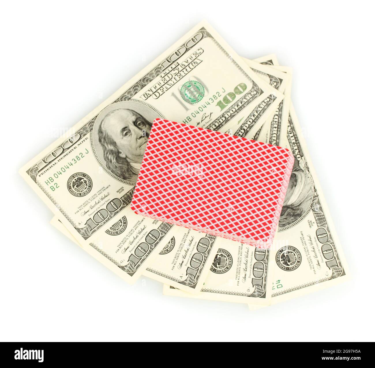 Dollars and a deck of playing cards isolated on white Stock Photo - Alamy