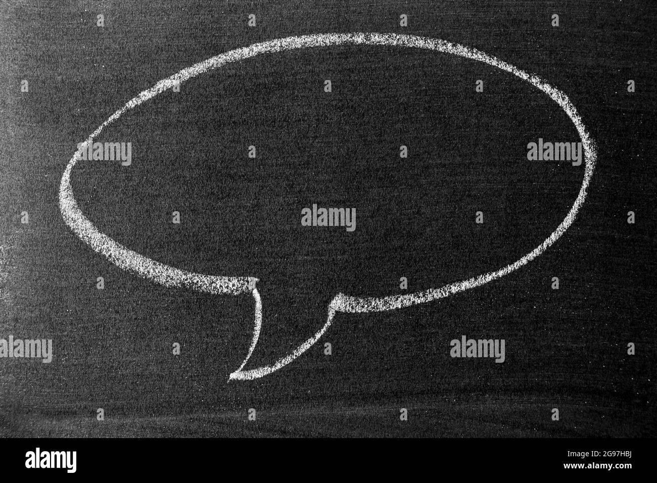 White color chalk hand drawing in round bubble speech shape with blank ...