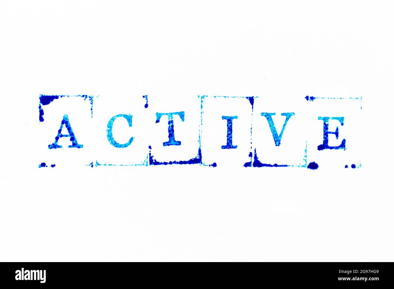 Blue color ink rubber stamp in word active on white paper background ...