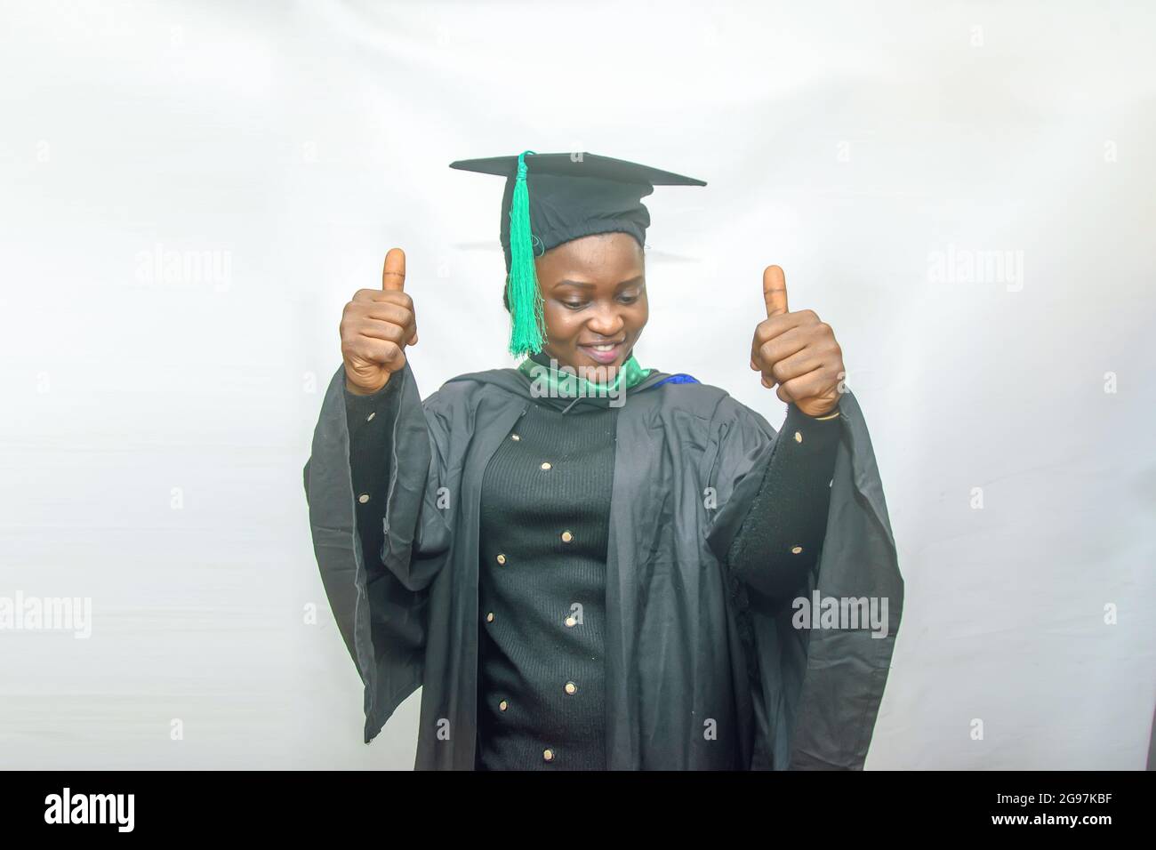 Stock photo of an African female graduand or graduating students in her ...