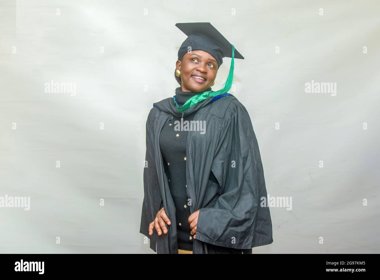 Portrait of a happy African female graduand or graduating students ...