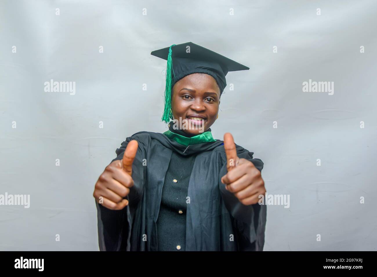 Stock photo of an African female graduand or graduating students in her ...