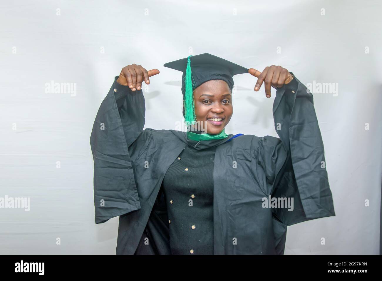 Stock photo of an African female graduand or graduating students moving ...