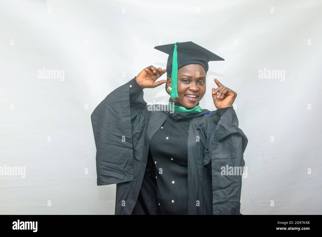 Stock photo of an African female graduand or graduating students moving ...