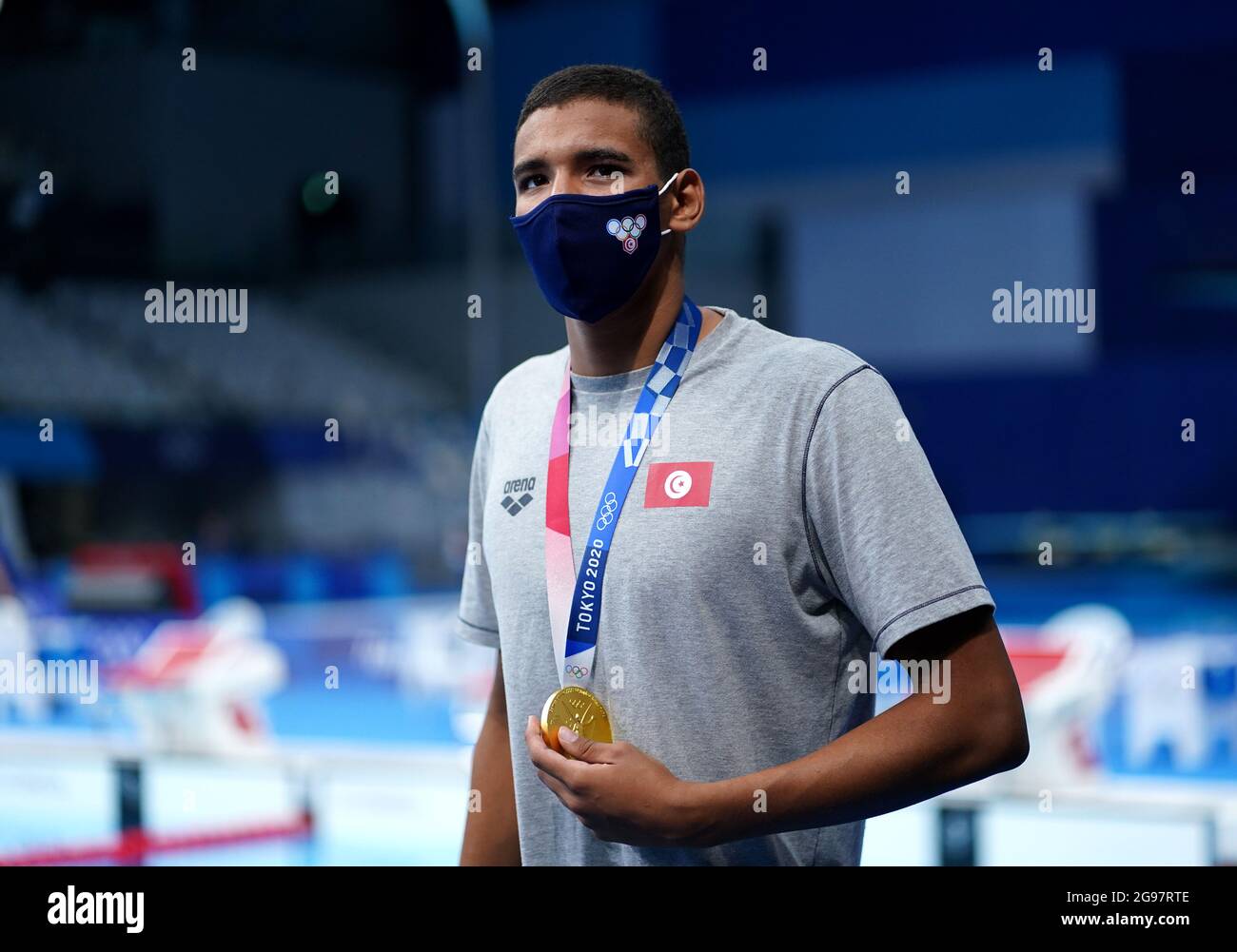 Tunisia's Ahmed Hafnaoui with his gold medal after winning the Men's ...