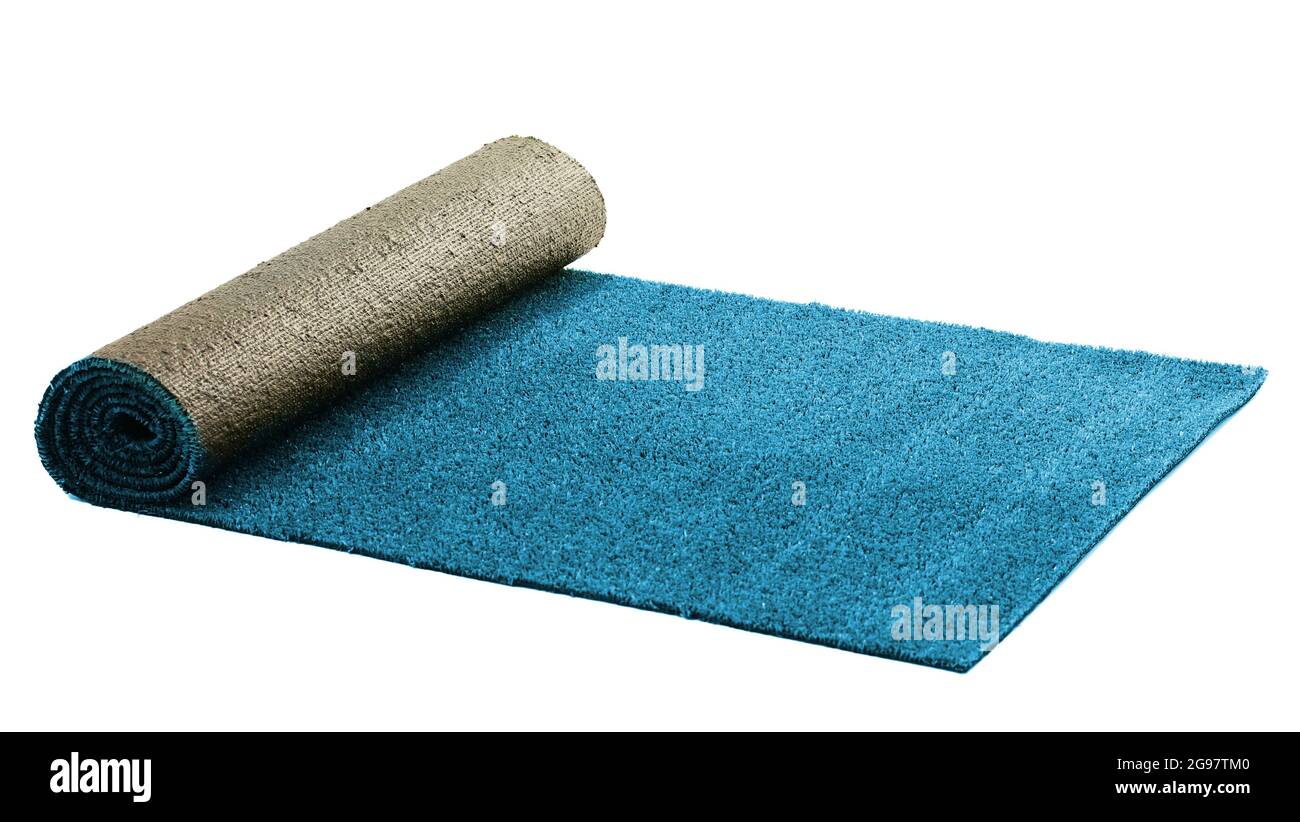 Artificial rolled light blue grass, isolated on white Stock Photo - Alamy