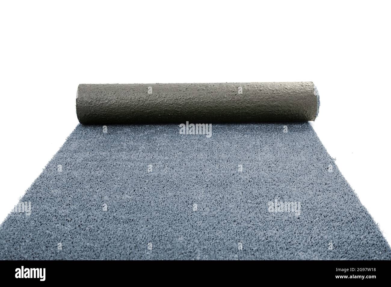 Artificial rolled grey grass isolated on white Stock Photo - Alamy