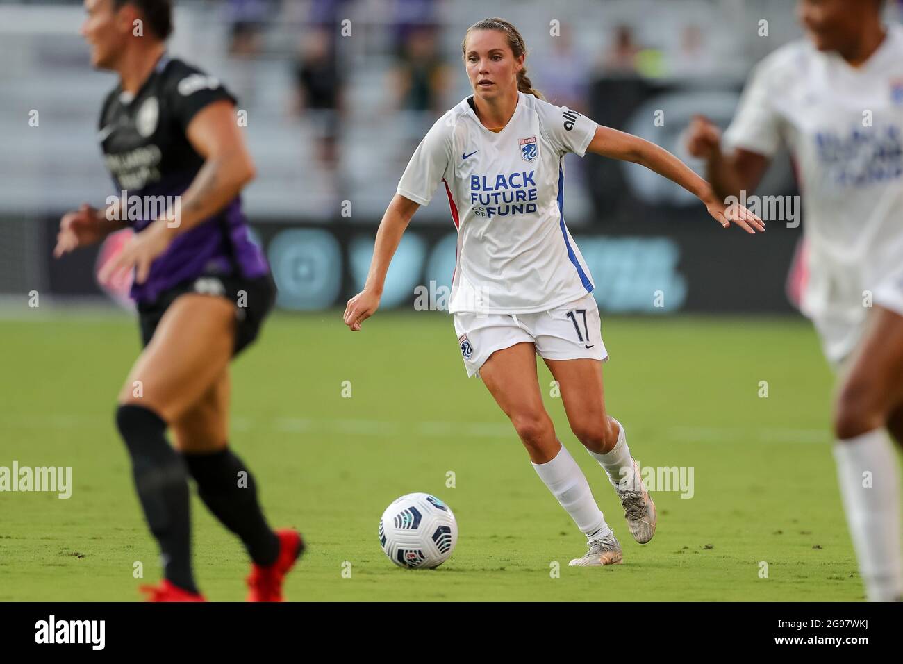 July 24, 2021: OL Reign midfielder DANI WEATHERHOLT (17) sets up a play ...