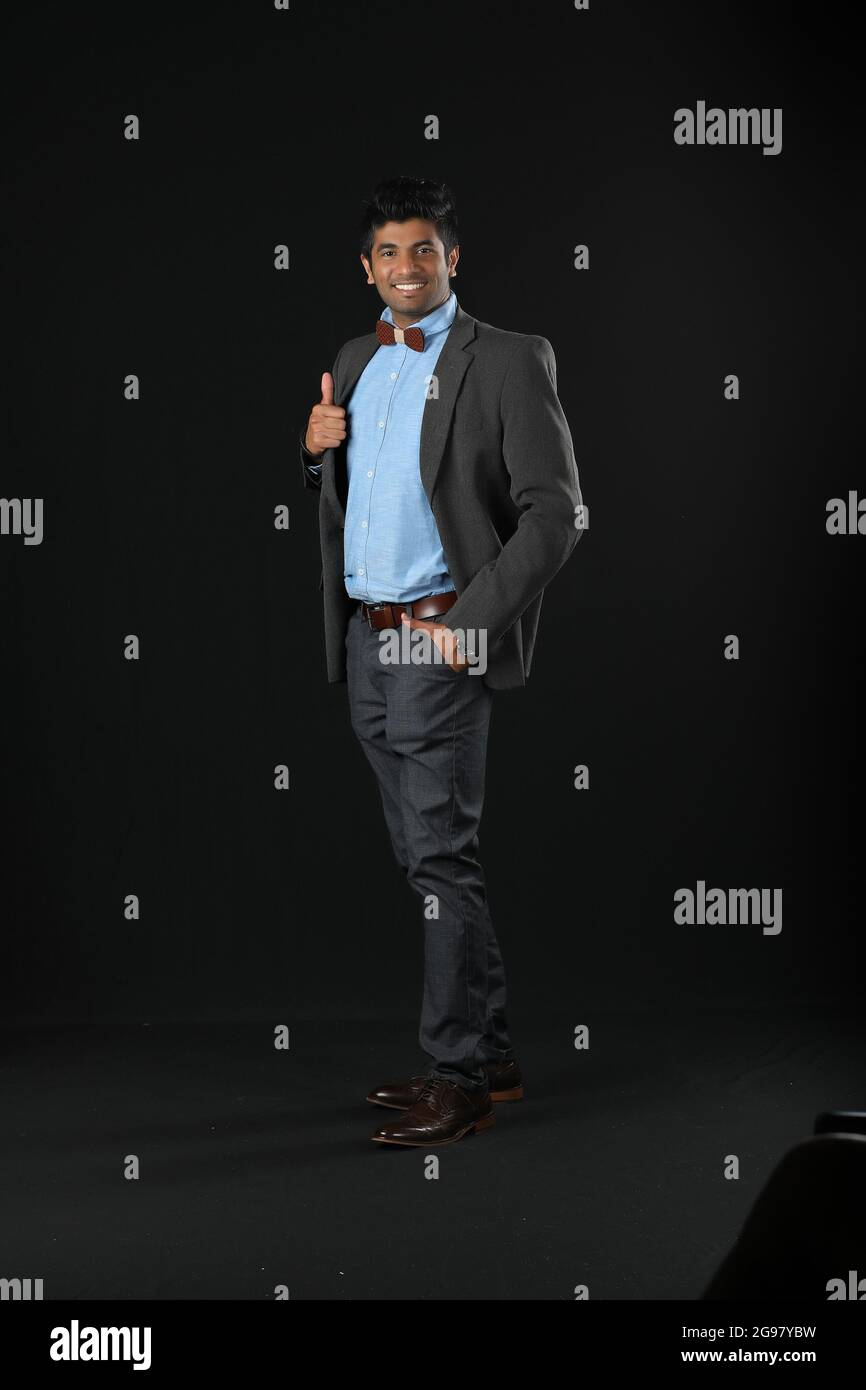 business, people and office concept - happy smiling Indian businessman ...