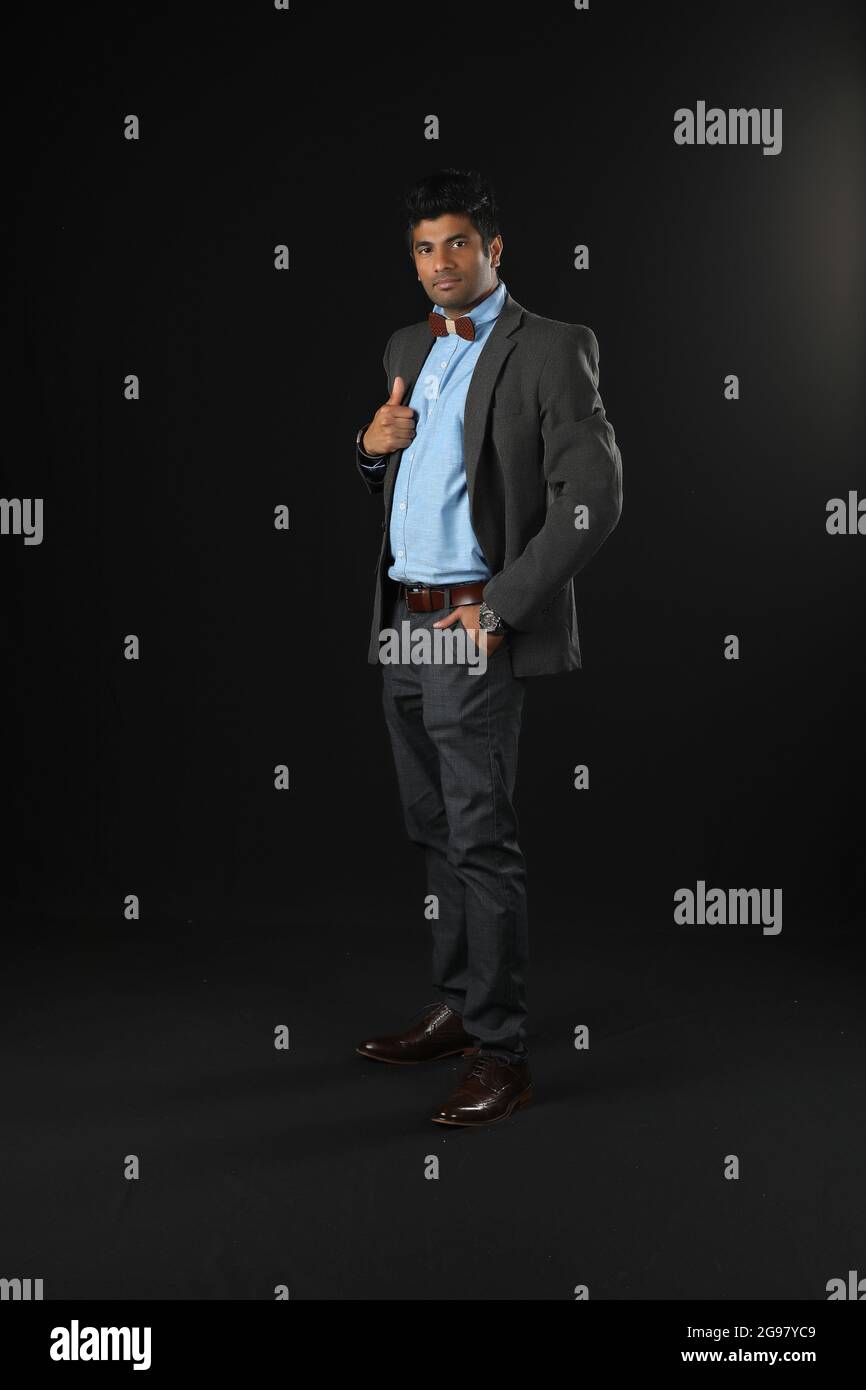 business, people and office concept - happy smiling Indian businessman ...