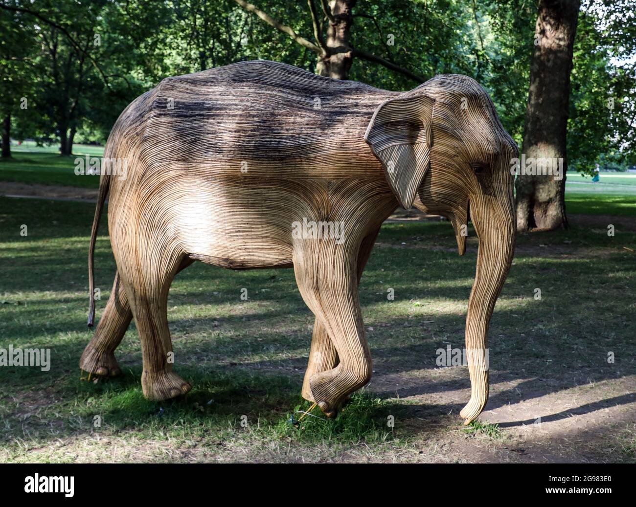 London, UK. 19th July, 2021. Life-size elephant sculptures spend their ...