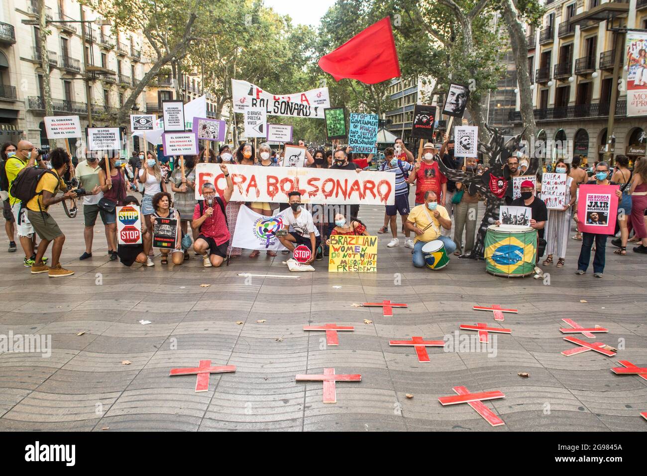 Barcelona, Spain. 24th July, 2021. Protesters seen holding a banner ...