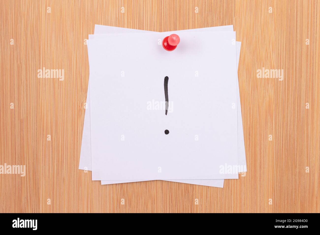 White Sticky Notes with Exclamation Point Pinned to the Wooden Message ...