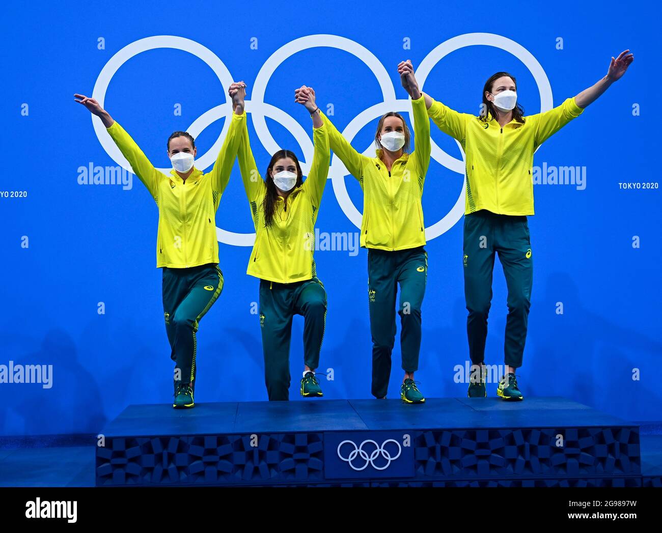 Tokyo, Japan. 25th July, 2021. Members of champion team Australia step ...