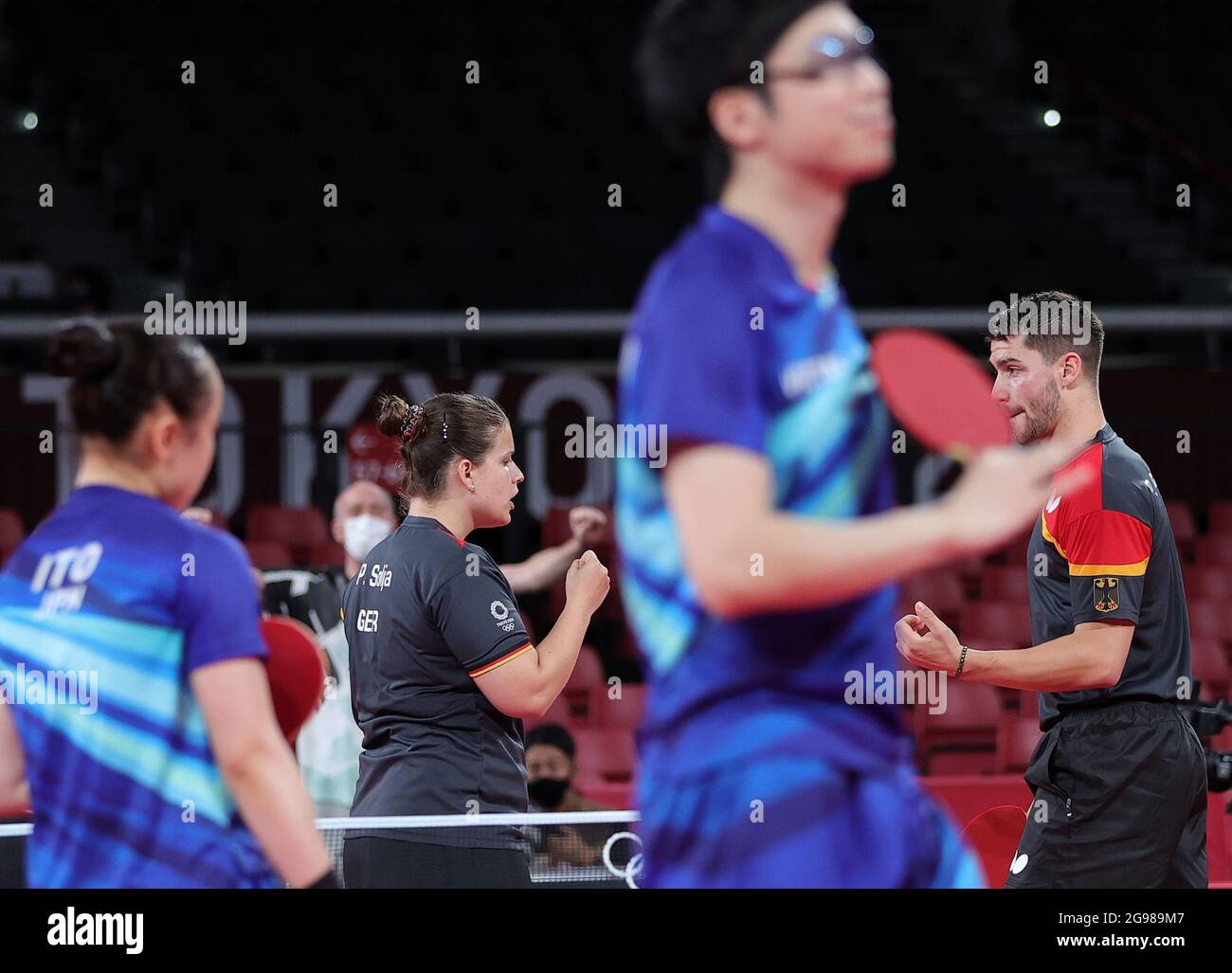 Tokyo, Japan. 25th July, 2021. Patrick Franziska (1st R, rear)/Petrissa ...