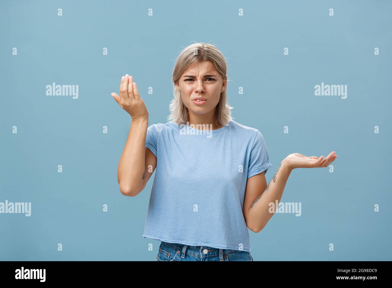 Wtf you saying. Portrait of pissed and confused stylish girlfriend with ...
