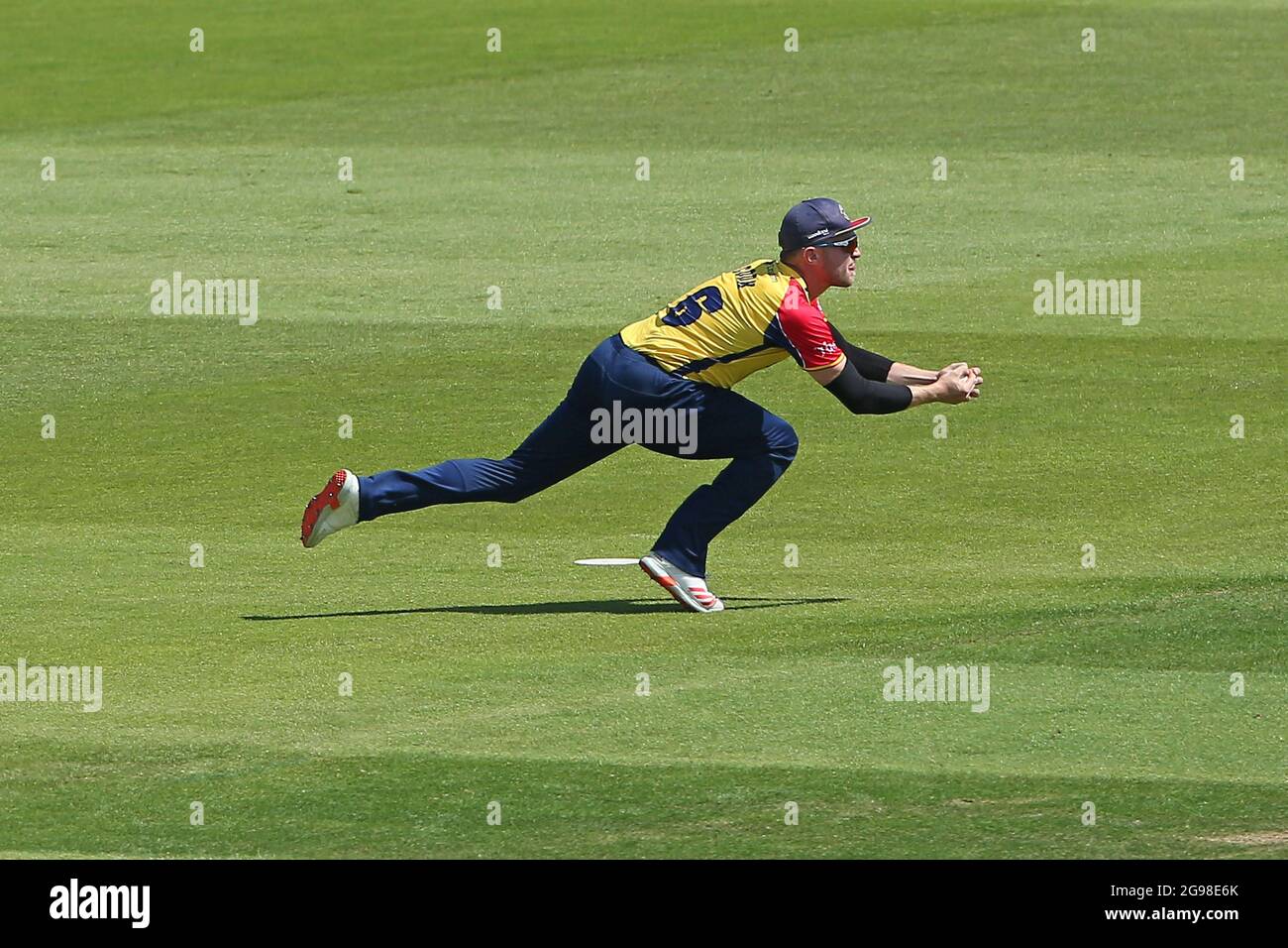 Sam Cook takes a catch to dismiss Liam Dawson from the bowling of Aron ...