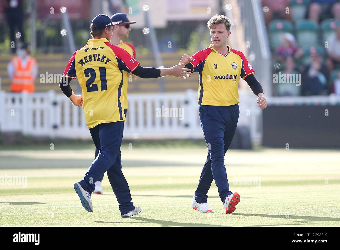 Sam Cook of Essex celebrates with his team mates after taking the ...