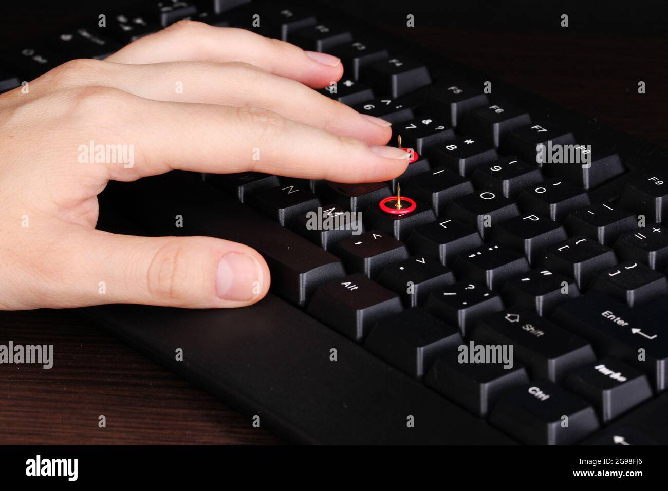 Painful typing on keyboard close-up Stock Photo - Alamy