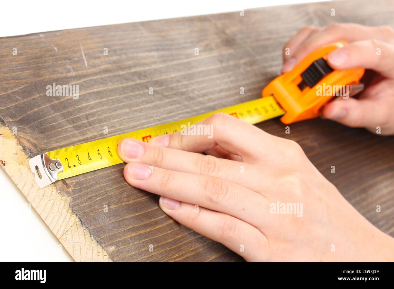 measuring wooden board close-up Stock Photo - Alamy