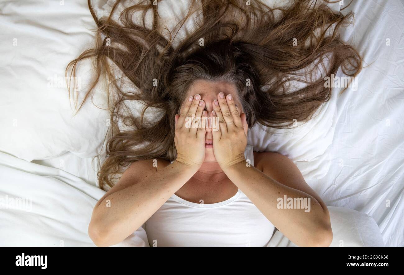 Female asleep head on hands hi-res stock photography and images - Alamy