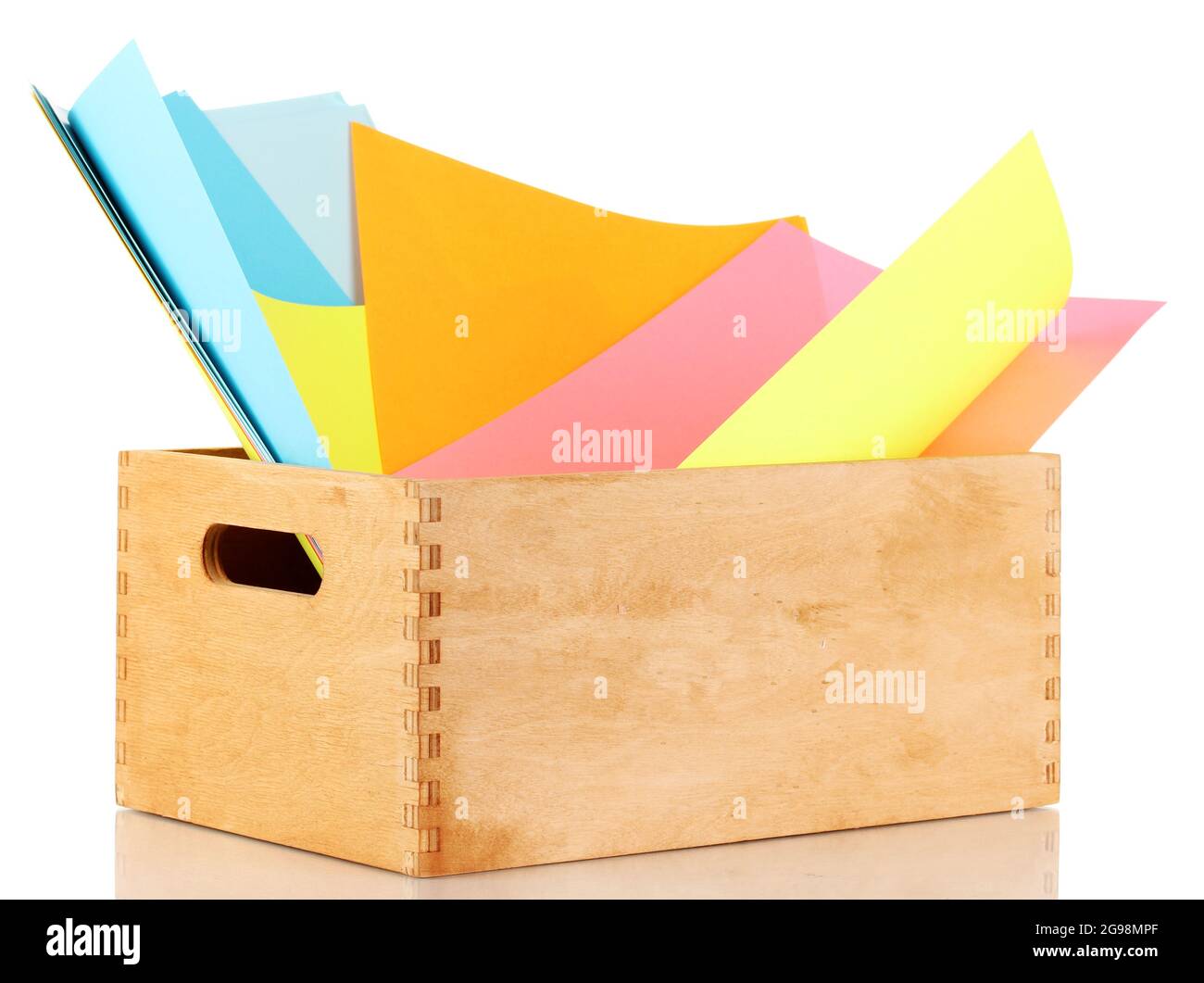 Wooden crate with colorful papers isolated on white Stock Photo - Alamy