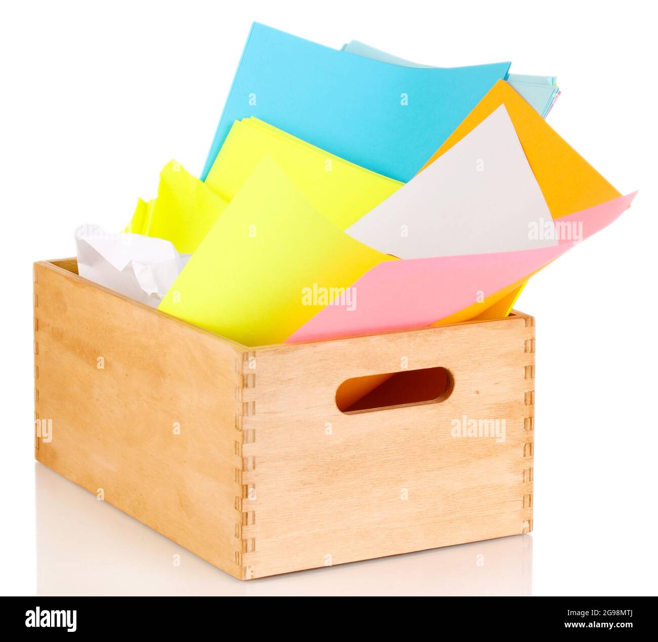 Wooden crate with colorful papers isolated on white Stock Photo - Alamy